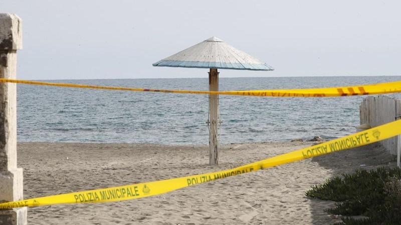 Italy: Boy dead after being buried alive in family beach holiday ...
