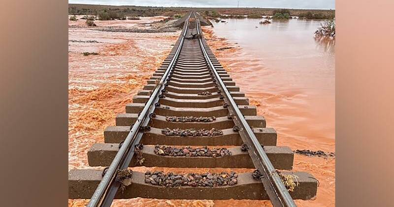 Rail link cut, shelves stripped as floods swamp outback - Australian ...