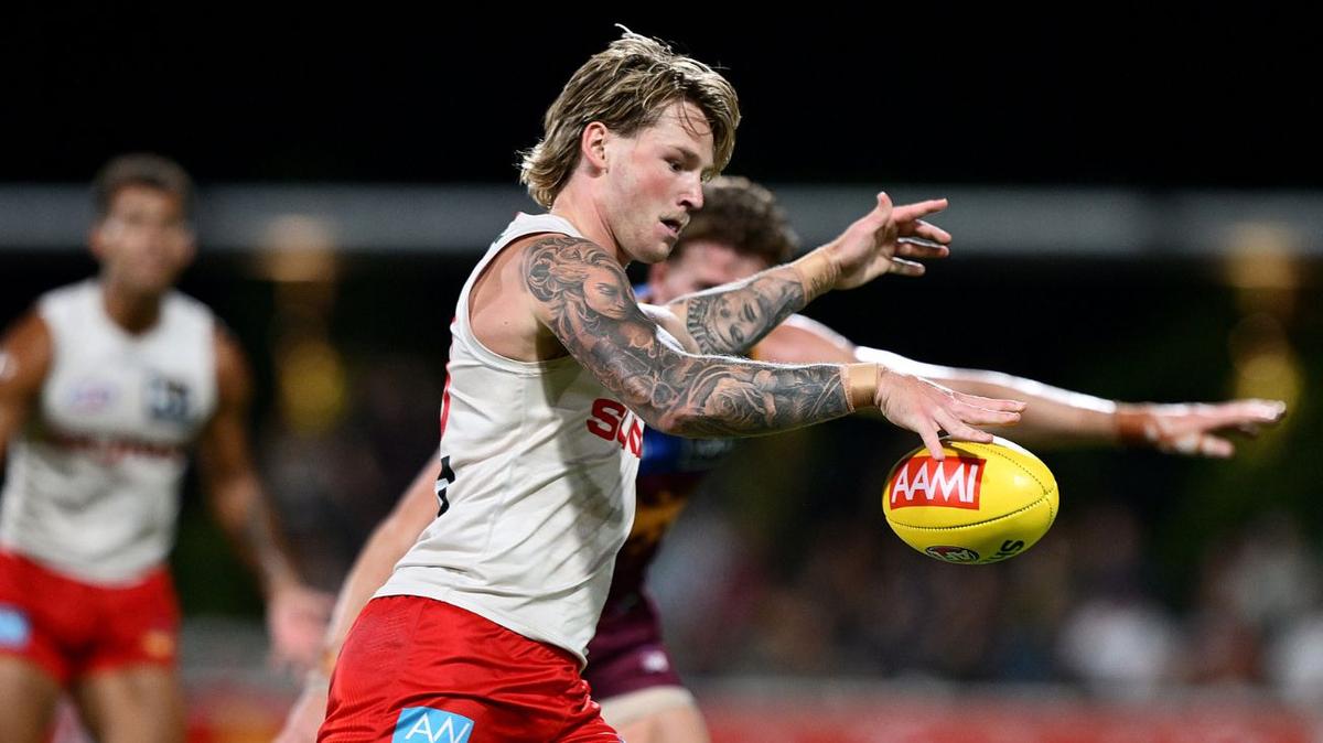 AFL experts and fans baffled by Gold Coast Suns’ red-and-white ‘Swans ...