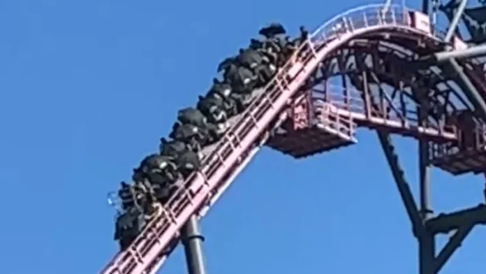 Movie World DC Rivals HyperCoaster: Passengers stuck midair on Gold ...
