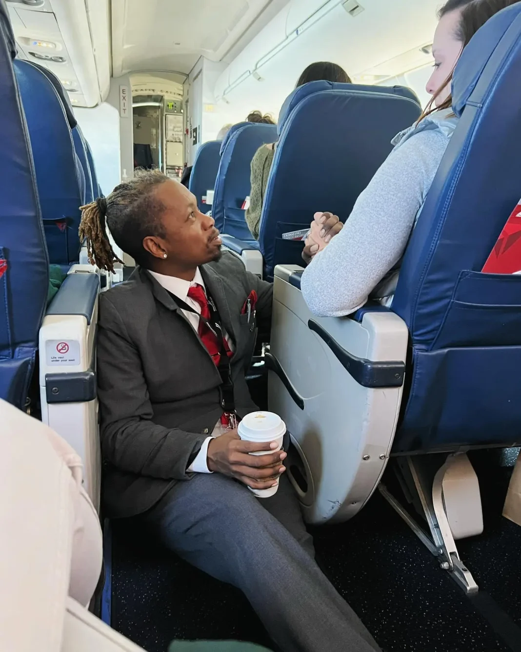 A scared passenger was shaking, so this flight attendant stopped ...